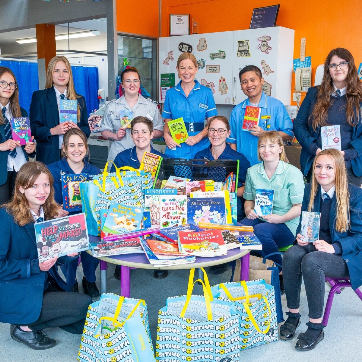 St Clement's High School - Students Deliver Stacks of Books to Children ...